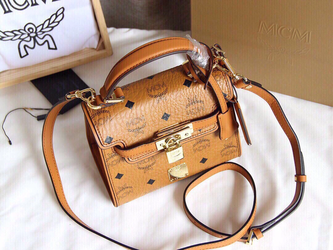 Indistinguishable MCM Top Handle Bags
