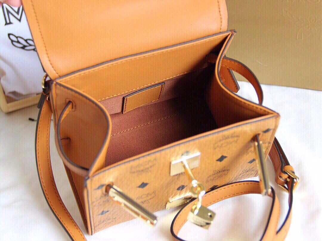 Indistinguishable MCM Top Handle Bags