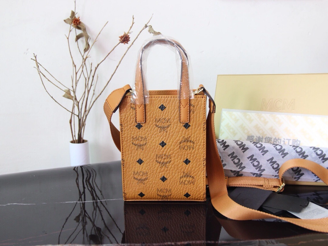 Top mirror MCM Top Handle Bags