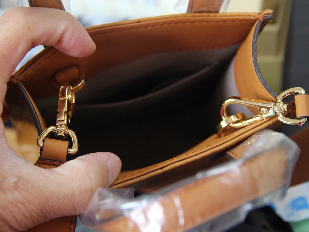 Top mirror MCM Top Handle Bags