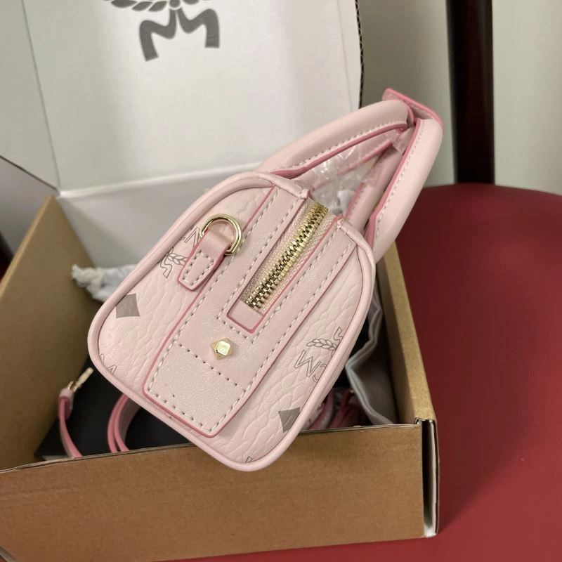 Budget-friendly MCM Top Handle Bags