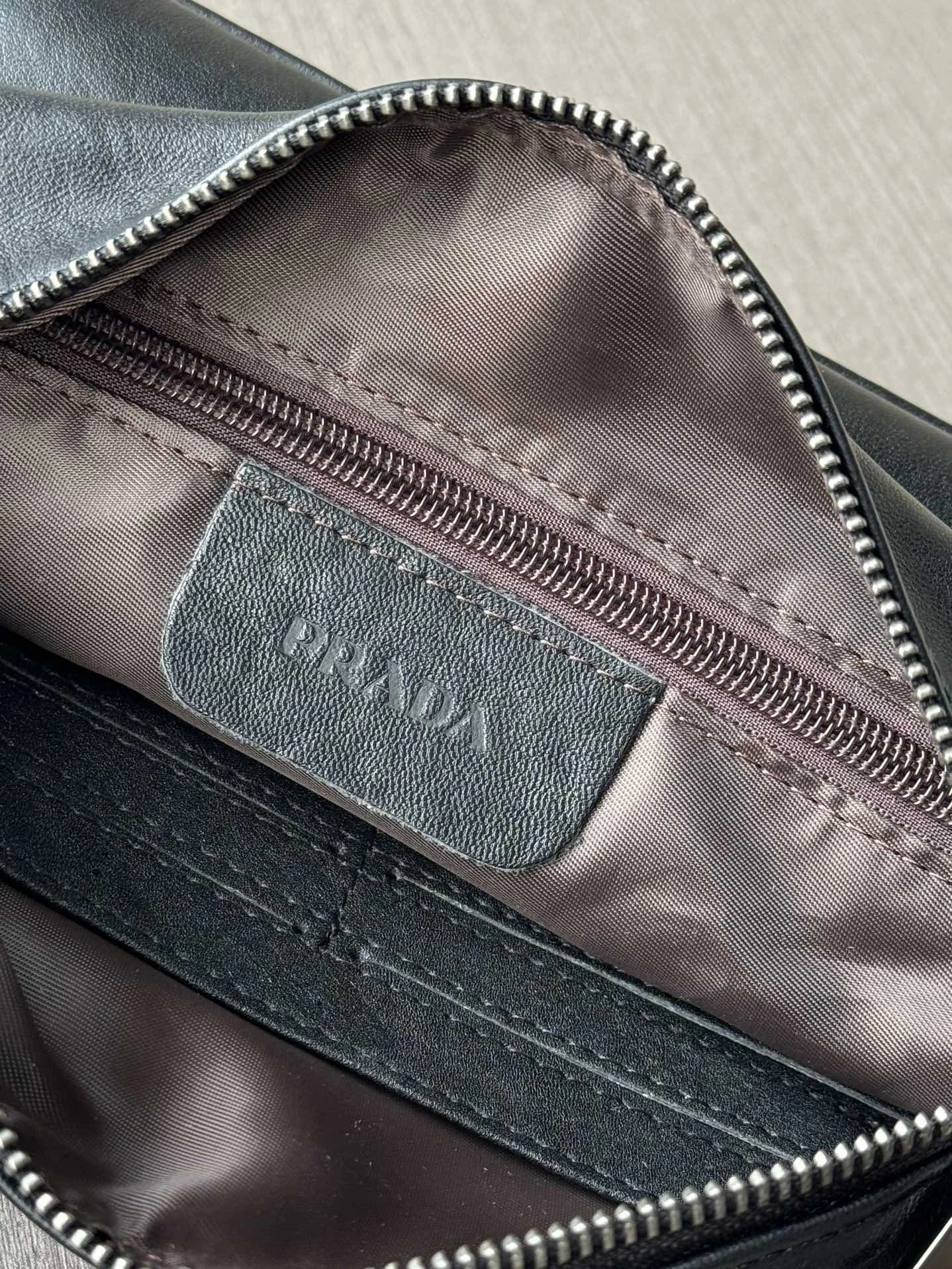 Indistinguishable Mens Prada Clutch Bags
