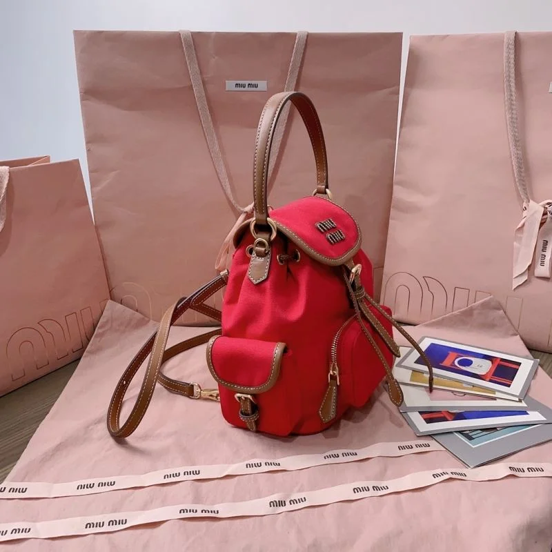 Top mirror Miu Miu Backpacks