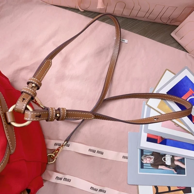 Top mirror Miu Miu Backpacks