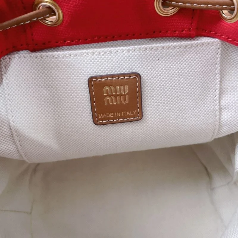 Top mirror Miu Miu Backpacks
