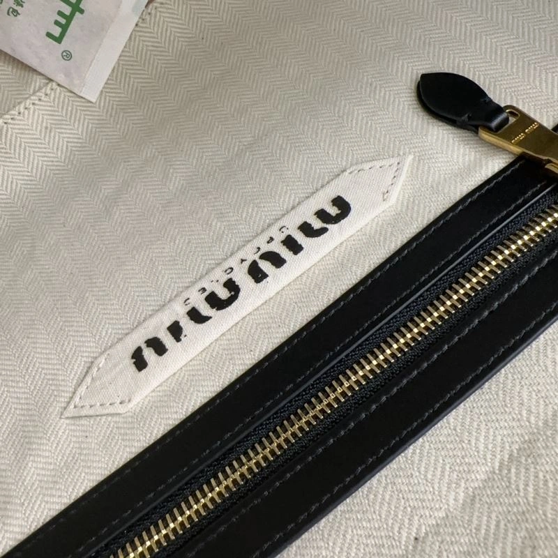 Value-priced Miu Miu Briefcases