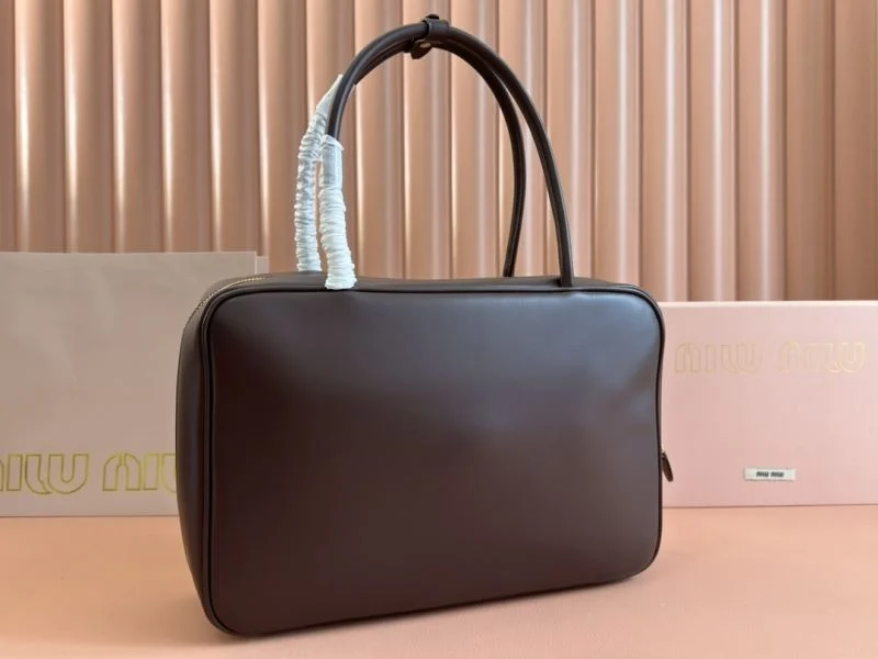 Indistinguishable Miu Miu Briefcases