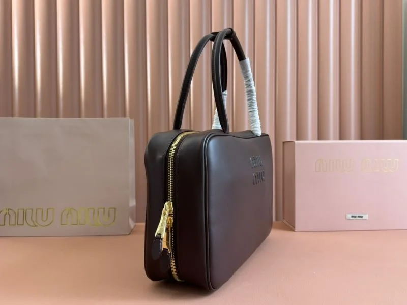 Indistinguishable Miu Miu Briefcases