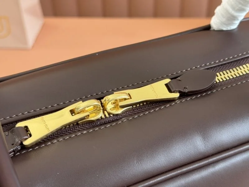 Indistinguishable Miu Miu Briefcases
