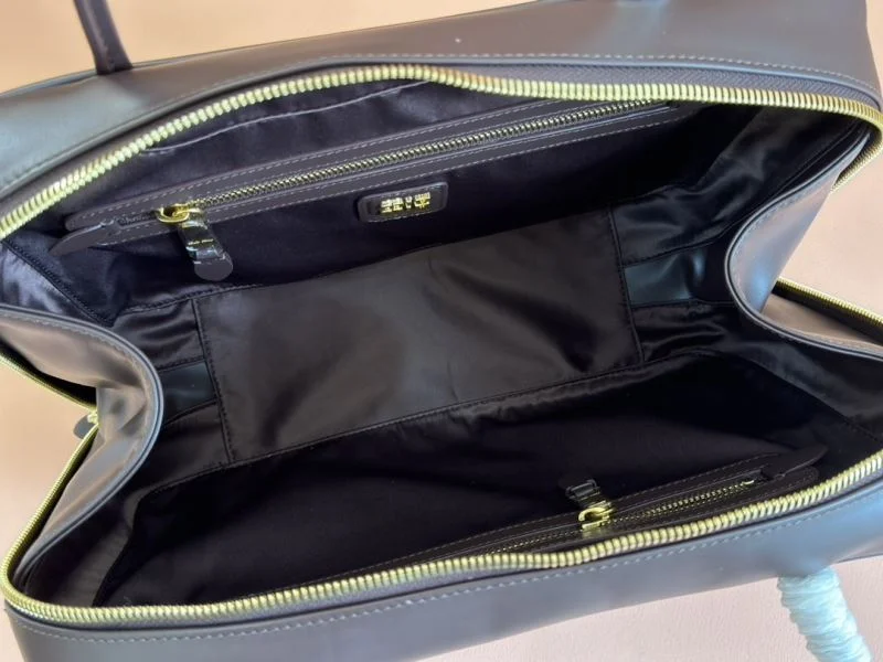 Indistinguishable Miu Miu Briefcases