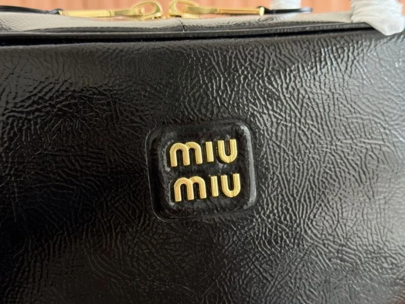 Value-priced Miu Miu Briefcases