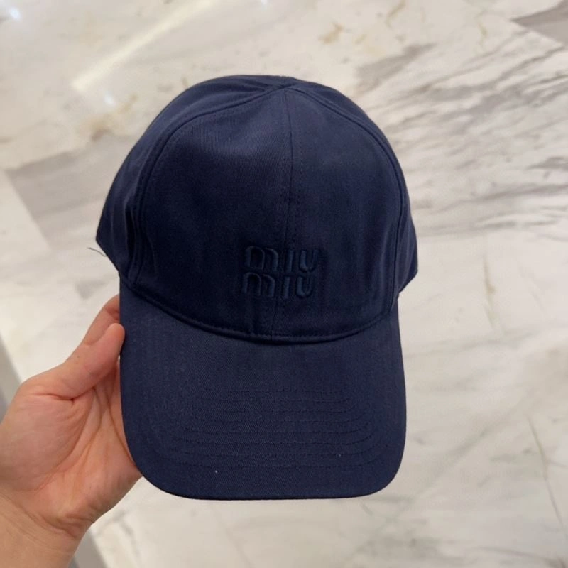 Top mirror Miu Miu Caps