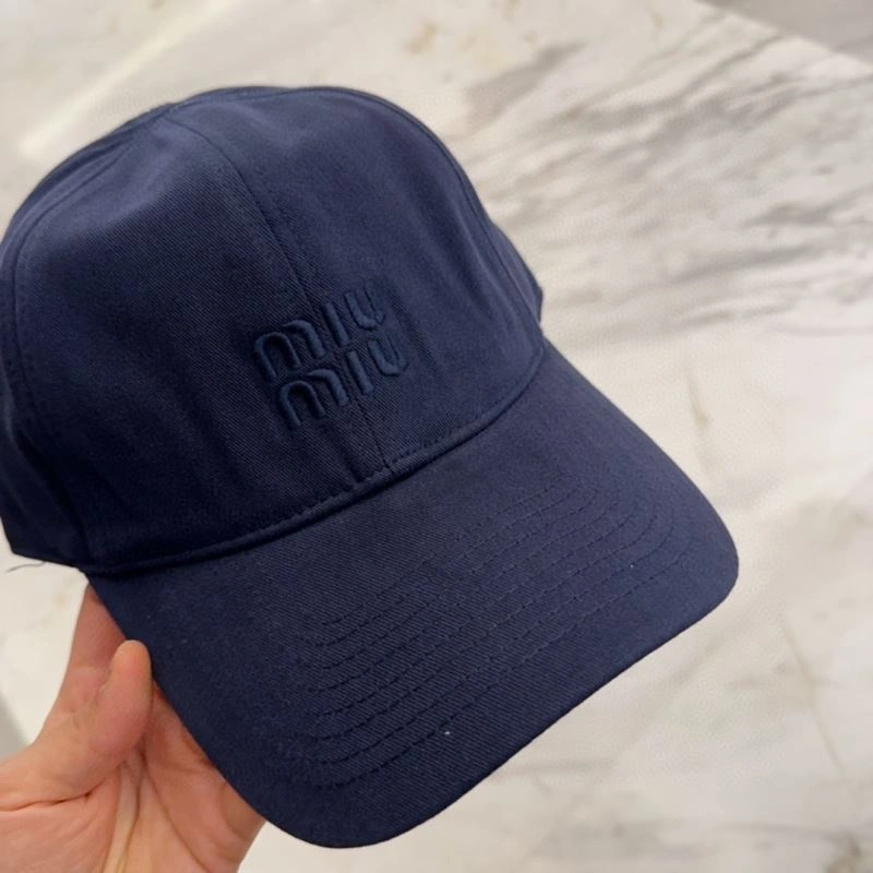 Top mirror Miu Miu Caps