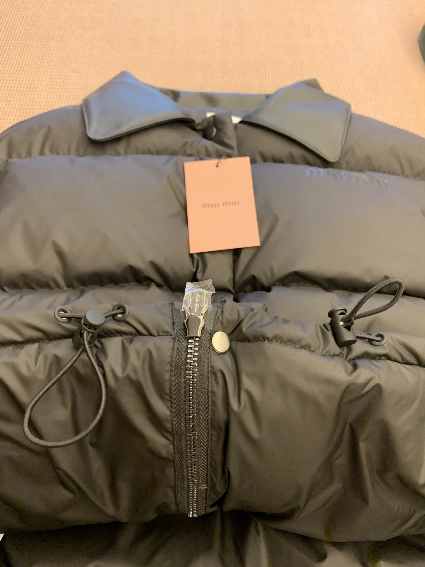 Accurate model Miu Miu Down Jackets