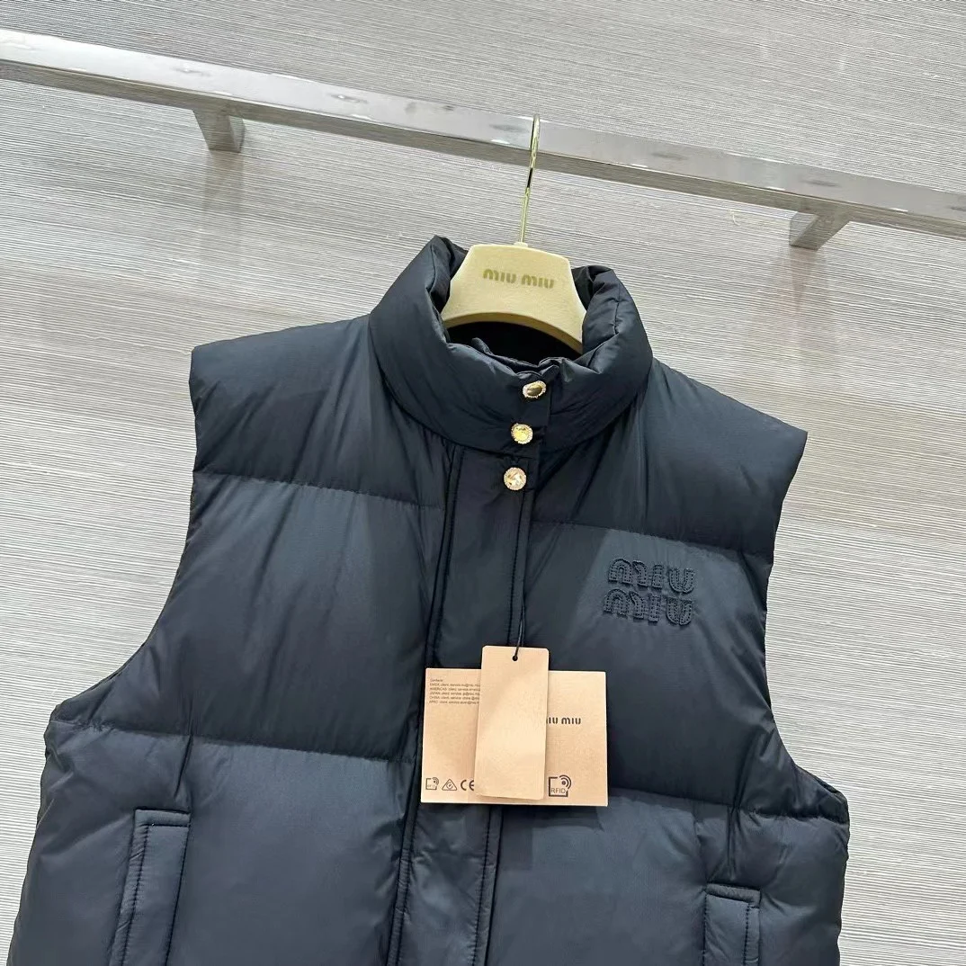 Top mirror Miu Miu Down Jackets