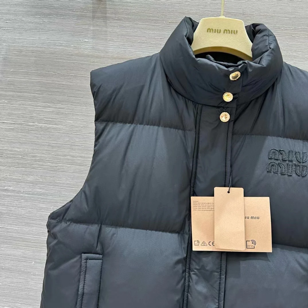 Top mirror Miu Miu Down Jackets