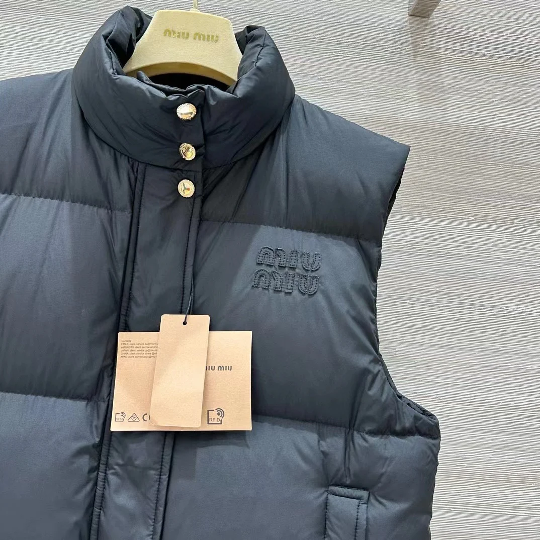 Top mirror Miu Miu Down Jackets