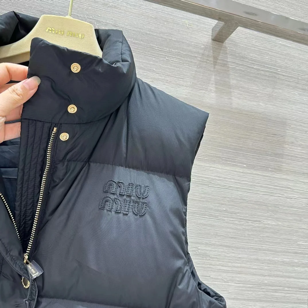 Top mirror Miu Miu Down Jackets