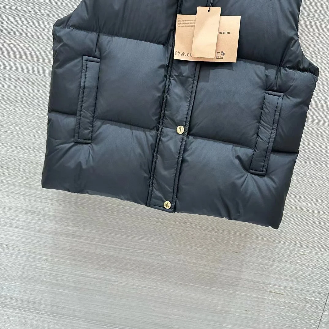 Top mirror Miu Miu Down Jackets