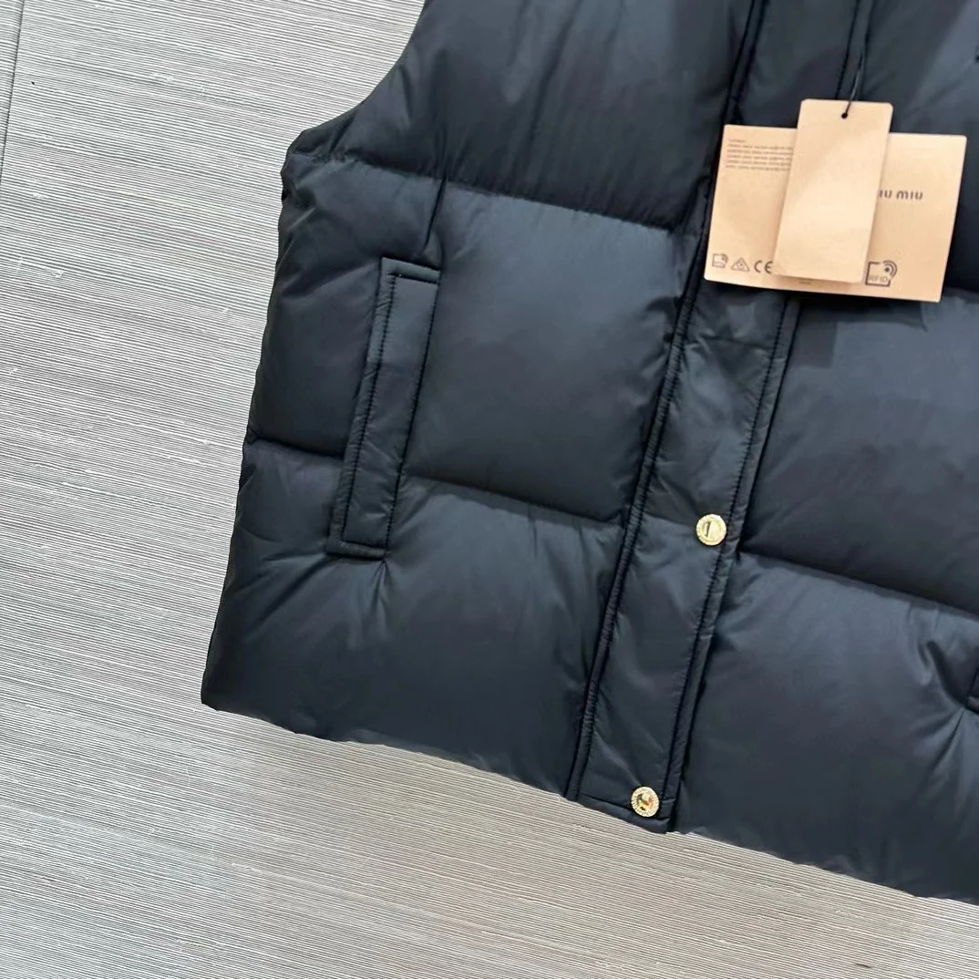 Top mirror Miu Miu Down Jackets