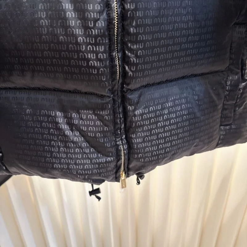 Top mirror Miu Miu Down Jackets
