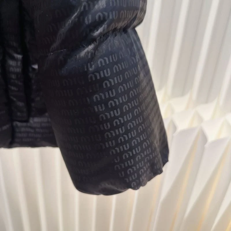 Top mirror Miu Miu Down Jackets