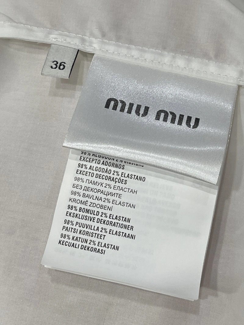 Exact replica Miu Miu Dress