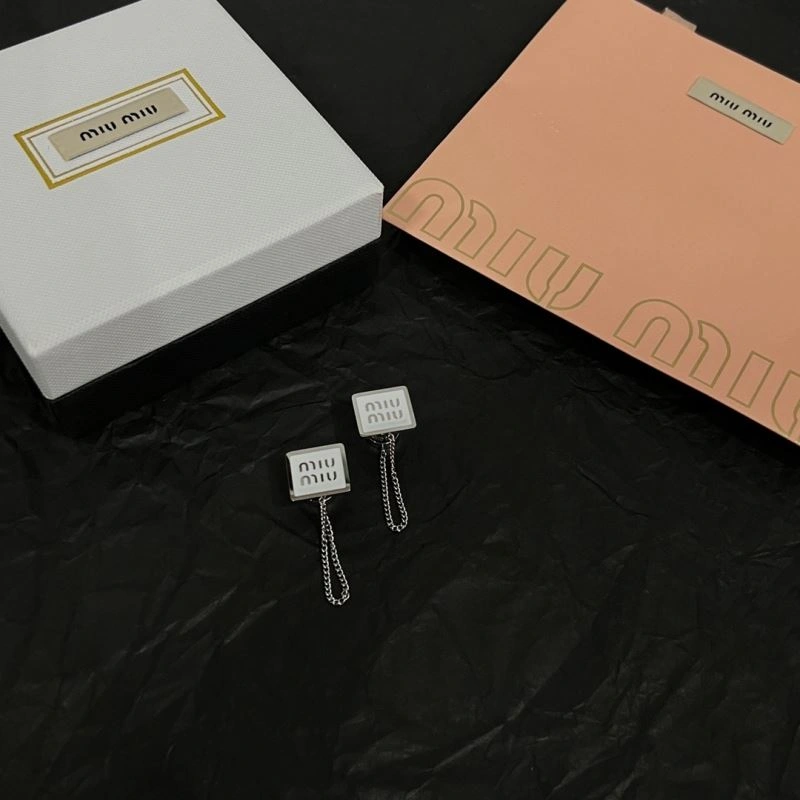 Indistinguishable Miu Miu Earrings