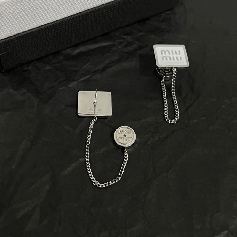 Indistinguishable Miu Miu Earrings