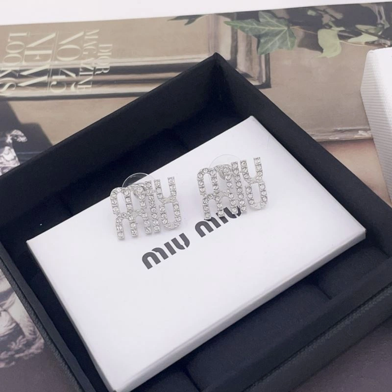 Indistinguishable Miu Miu Earrings