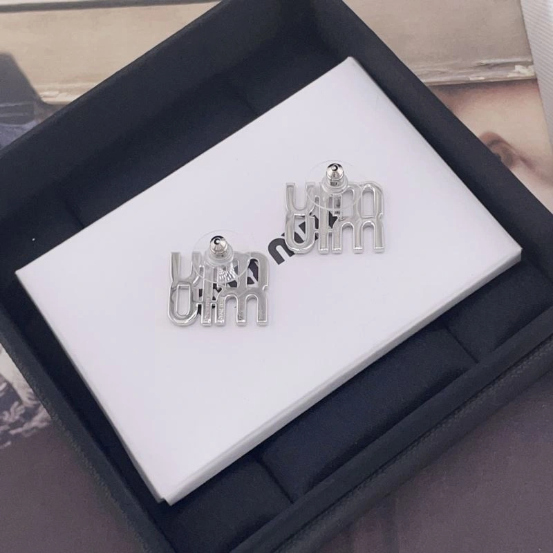Indistinguishable Miu Miu Earrings