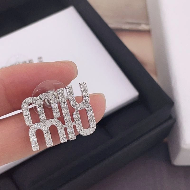 Indistinguishable Miu Miu Earrings