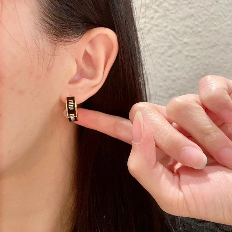 Indistinguishable Miu Miu Earrings