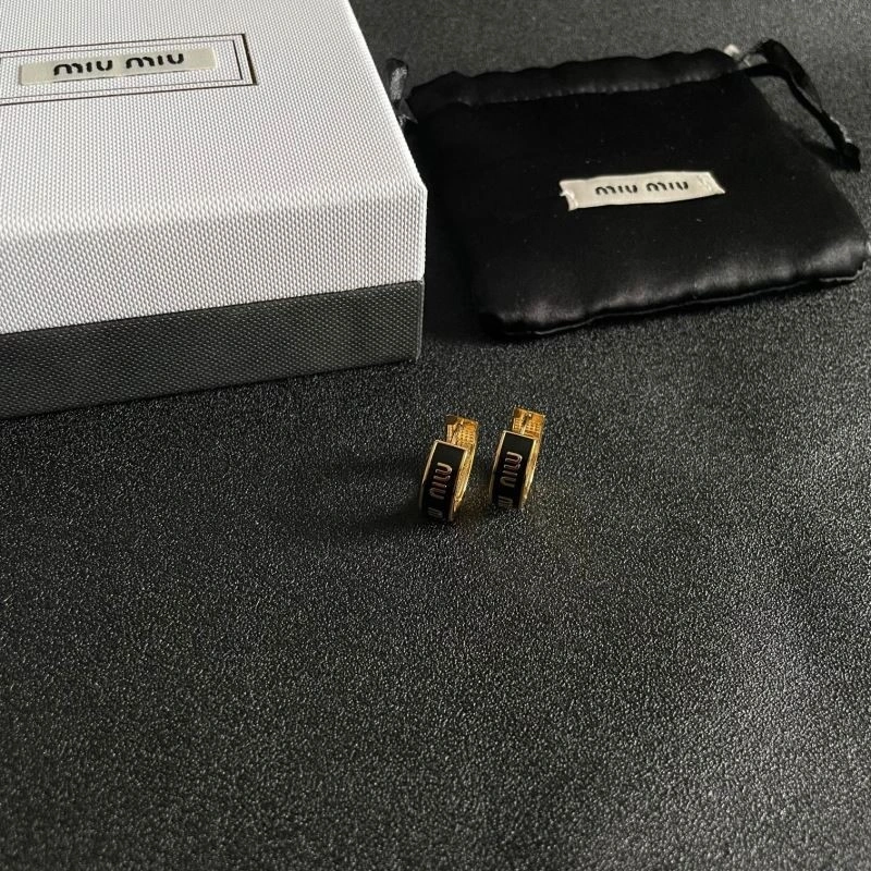 Indistinguishable Miu Miu Earrings