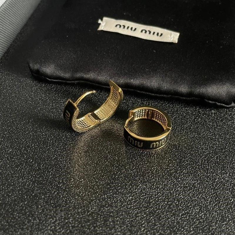Indistinguishable Miu Miu Earrings