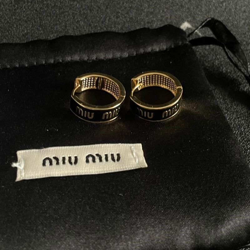 Indistinguishable Miu Miu Earrings