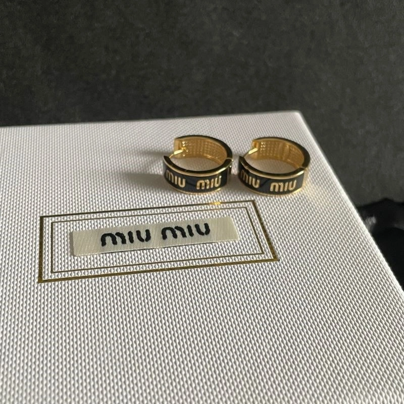Indistinguishable Miu Miu Earrings