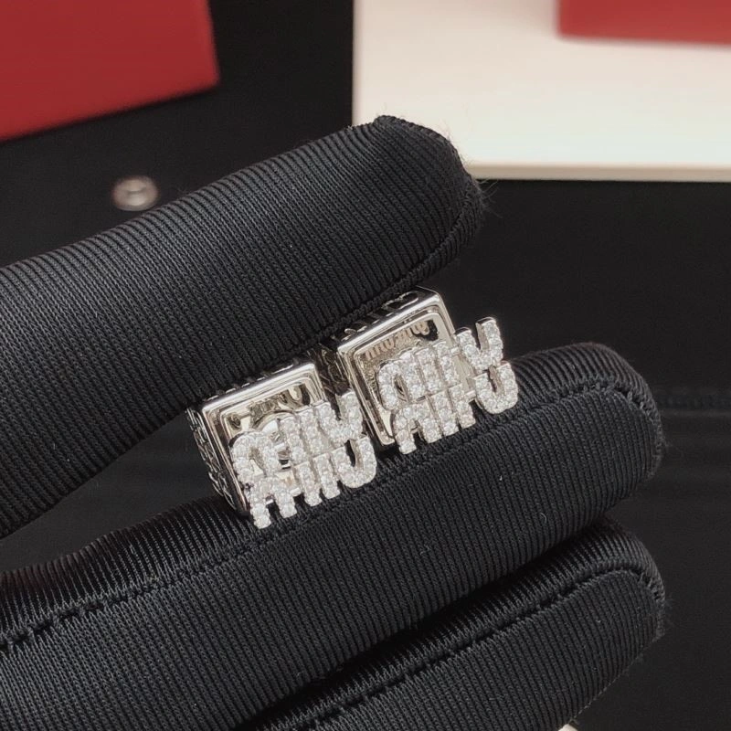 Indistinguishable Miu Miu Earrings
