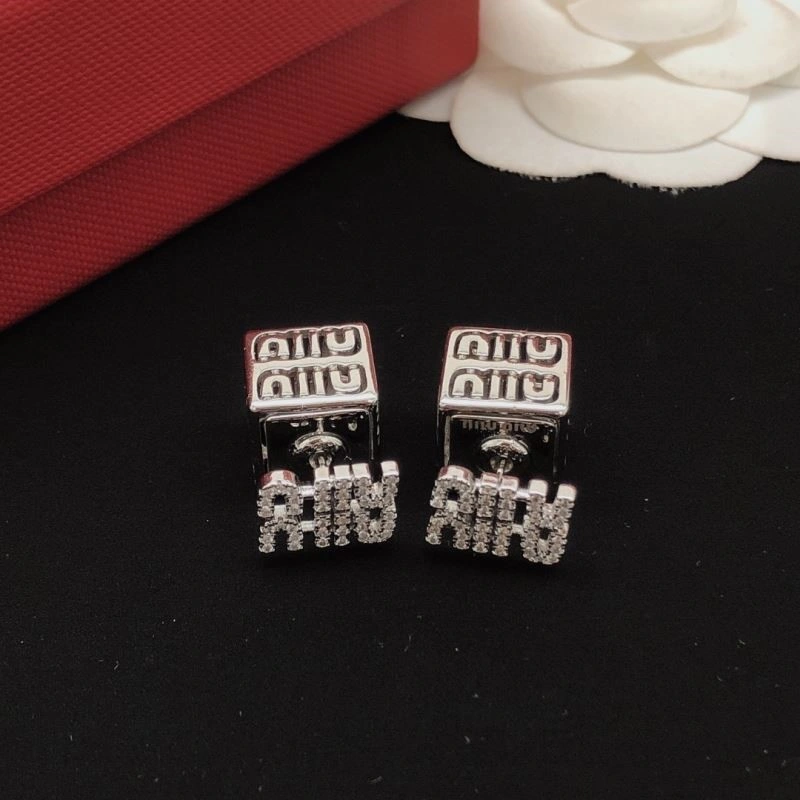 Indistinguishable Miu Miu Earrings