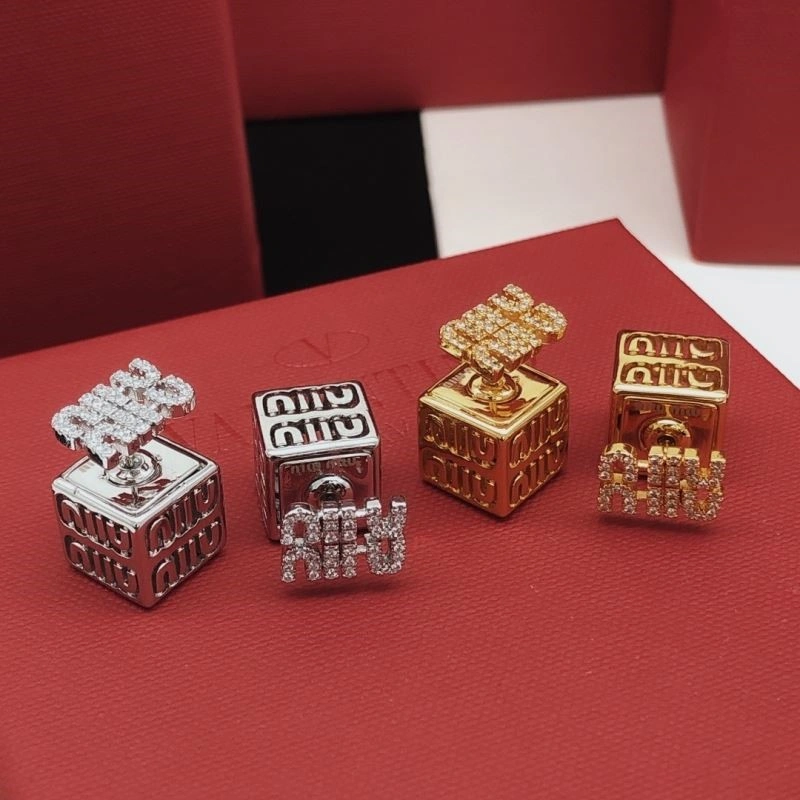Indistinguishable Miu Miu Earrings