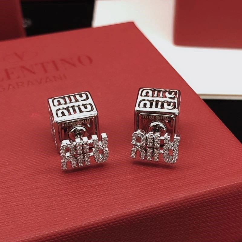 Indistinguishable Miu Miu Earrings