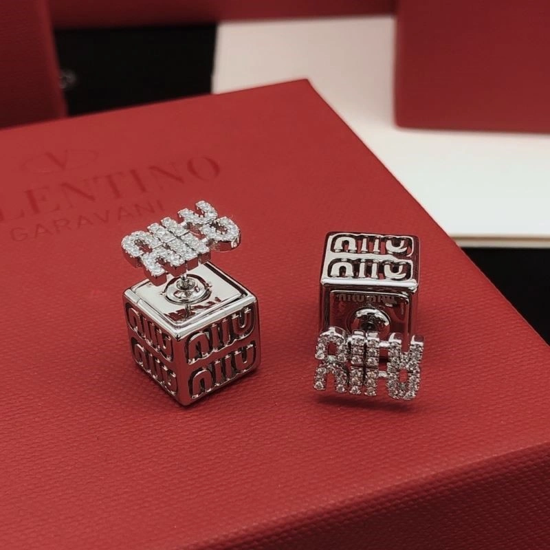 Indistinguishable Miu Miu Earrings