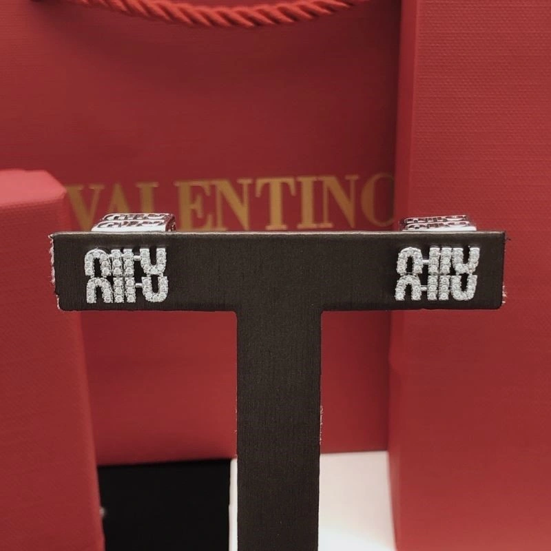 Indistinguishable Miu Miu Earrings