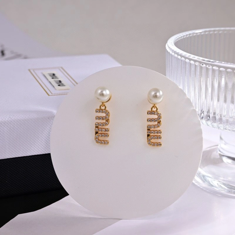 Indistinguishable Miu Miu Earrings