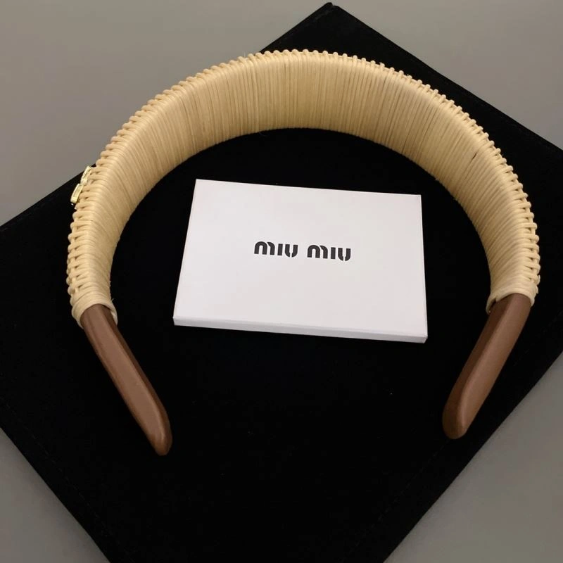 Indistinguishable Miu Miu Hairpins