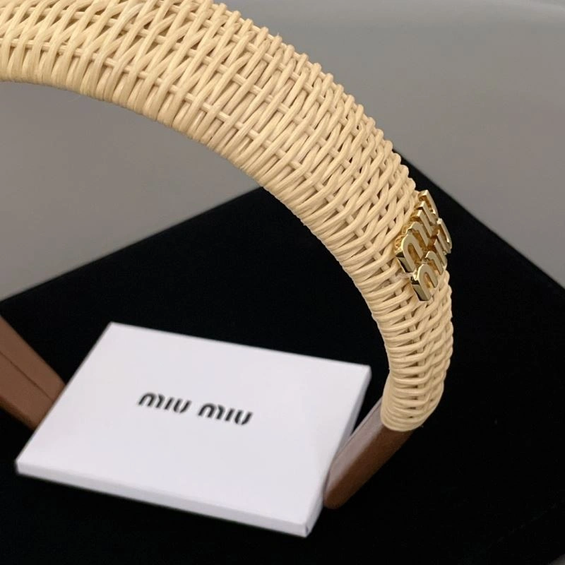 Indistinguishable Miu Miu Hairpins
