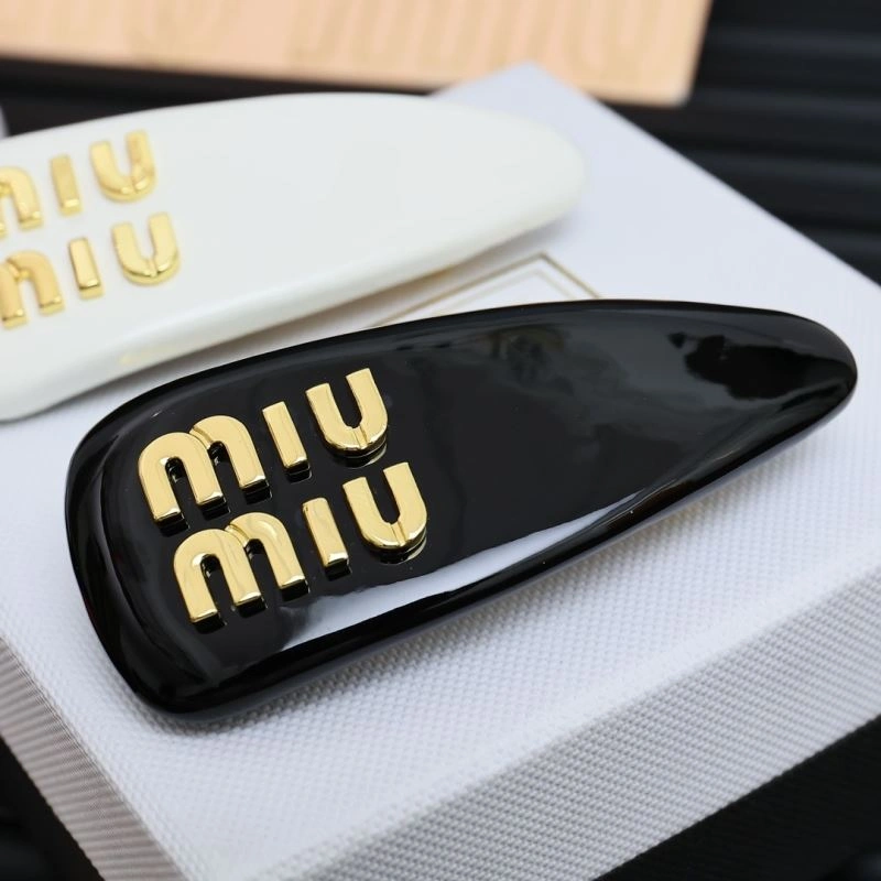 Indistinguishable Miu Miu Hairpins