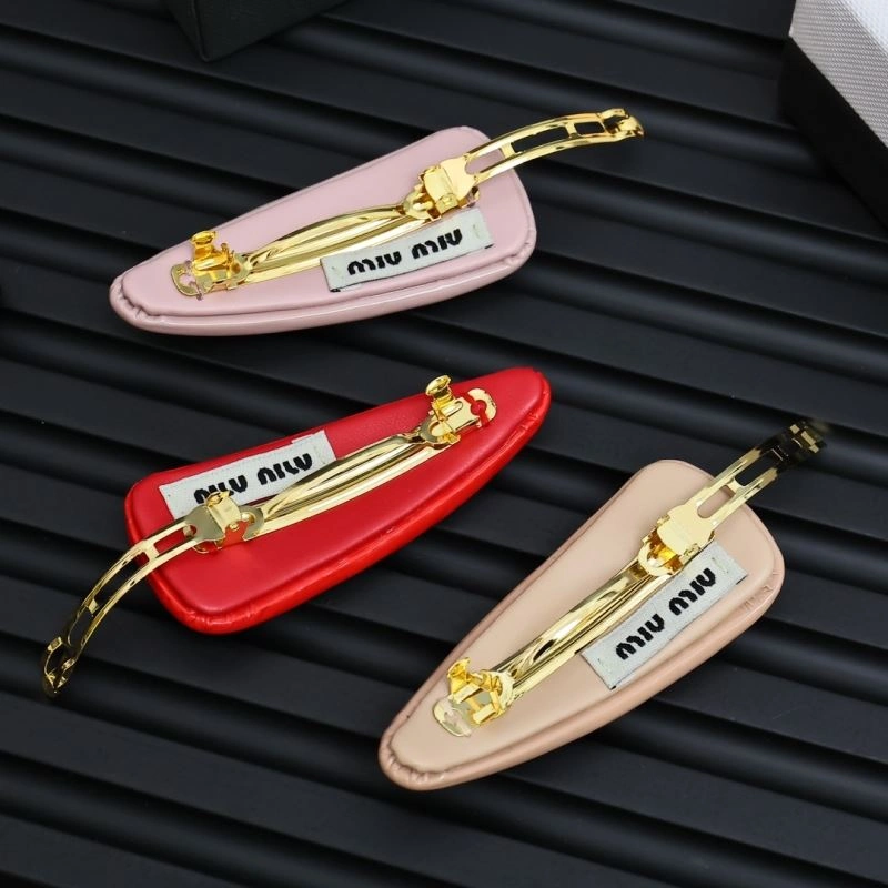 Indistinguishable Miu Miu Hairpins