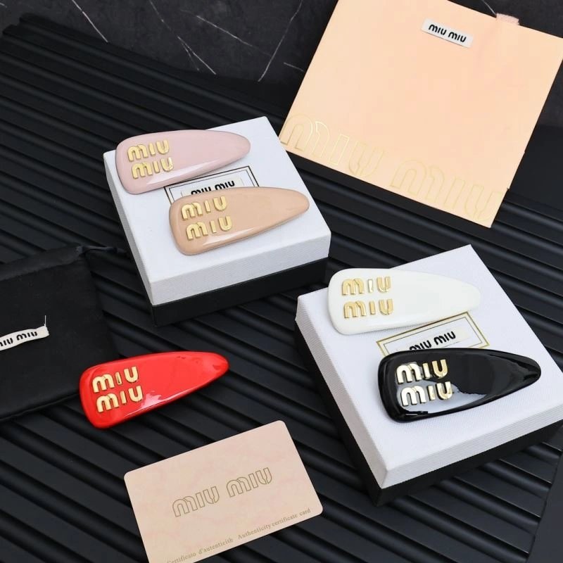 Indistinguishable Miu Miu Hairpins