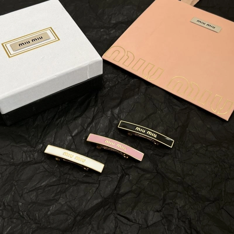 Indistinguishable Miu Miu Hairpins